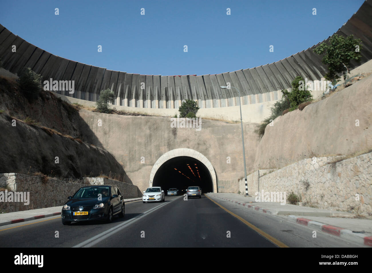 West Bank separation barrier over the highway tunnel along Highway or ...