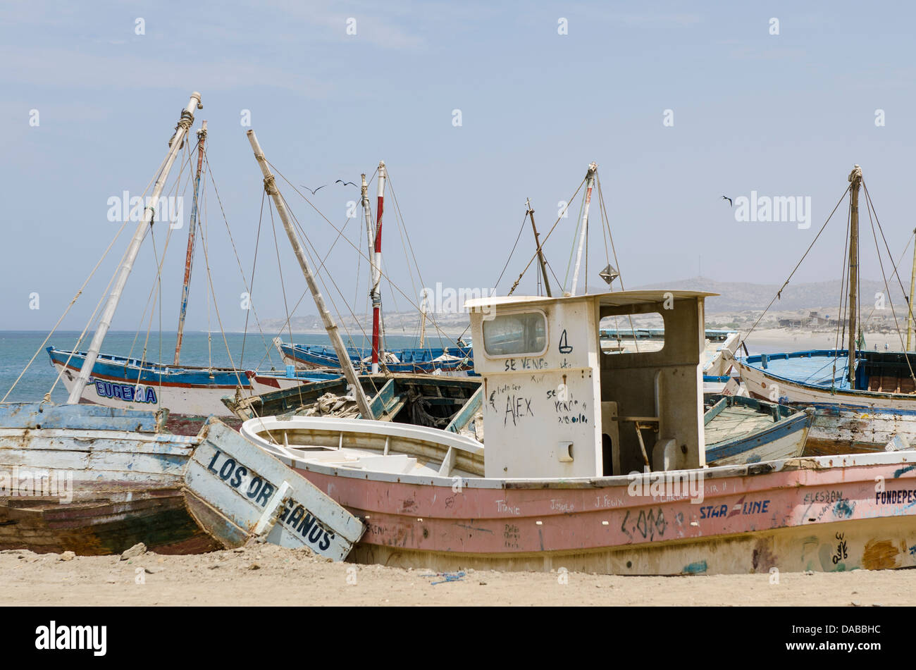Abandoned fishing boats on beach Los Organos village near Mancora, Peru ...