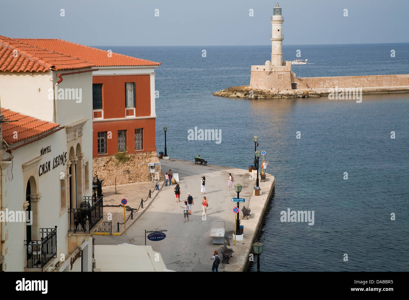 A broad promenade lined with tourist shops and cafes circles the lovely ...