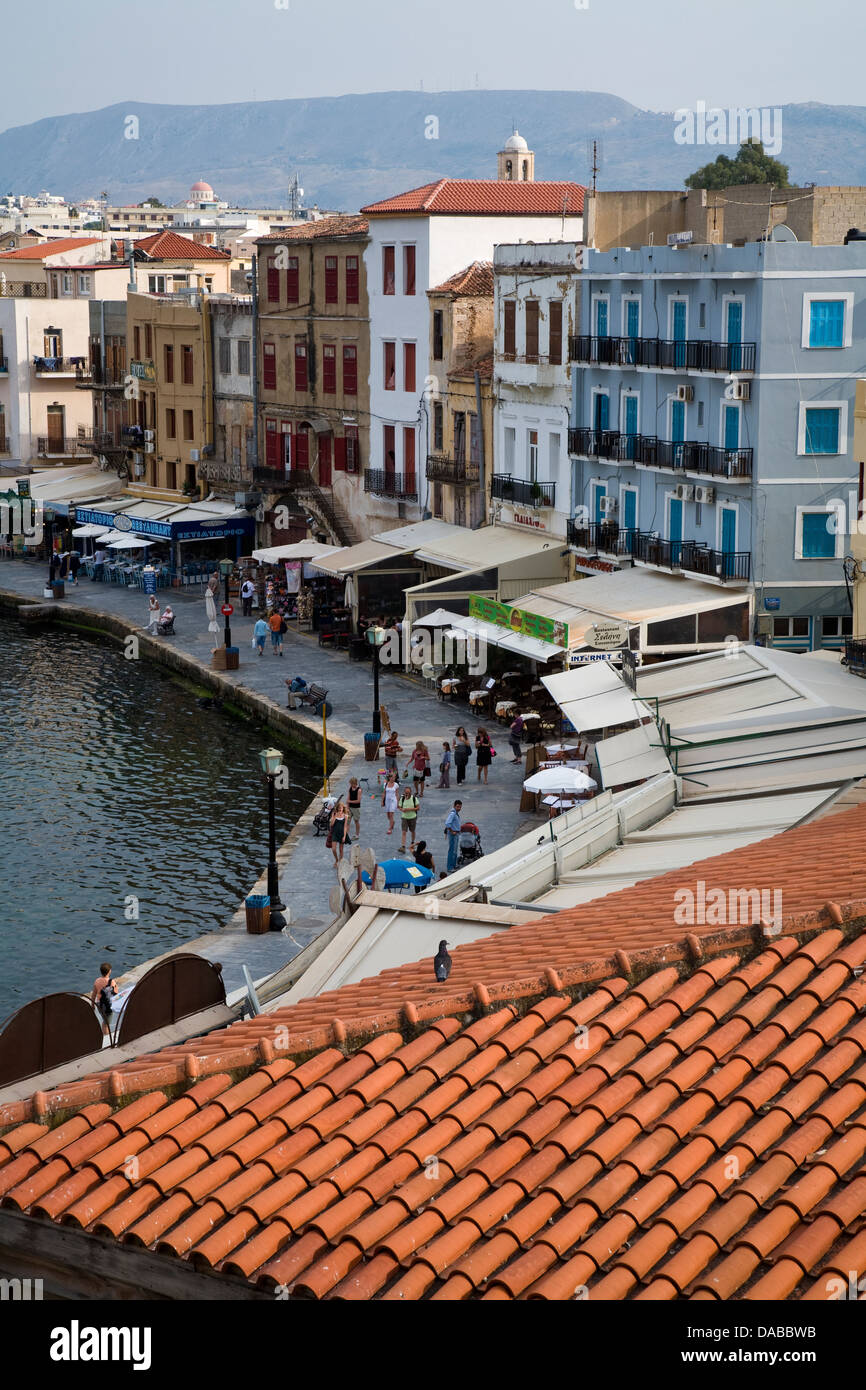 A broad promenade lined with tourist shops and cafes circles the lovely ...