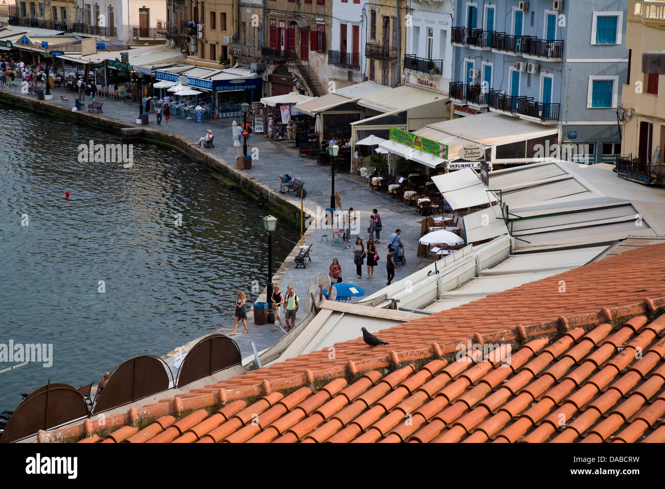 A broad promenade lined with tourist shops and cafes circles the lovely ...