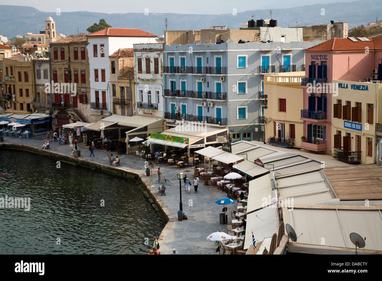 A broad promenade lined with tourist shops and cafes circles the lovely ...