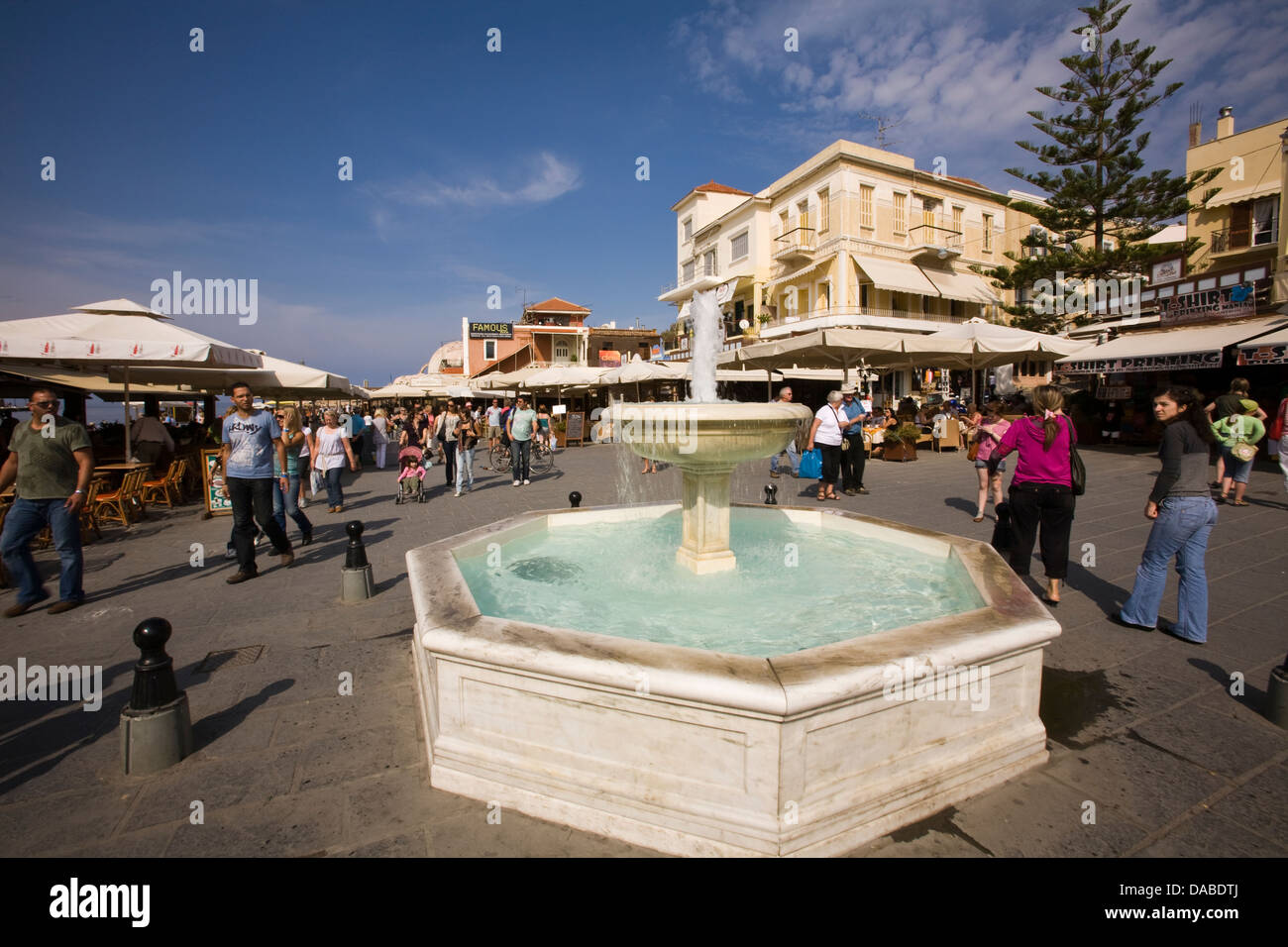 A broad promenade lined with tourist shops and cafes circles the lovely ...