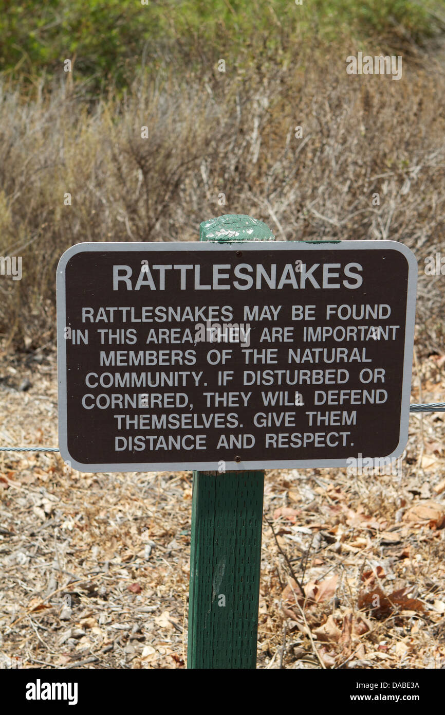 Sign warning of rattlesnakes in a California park Stock Photo - Alamy