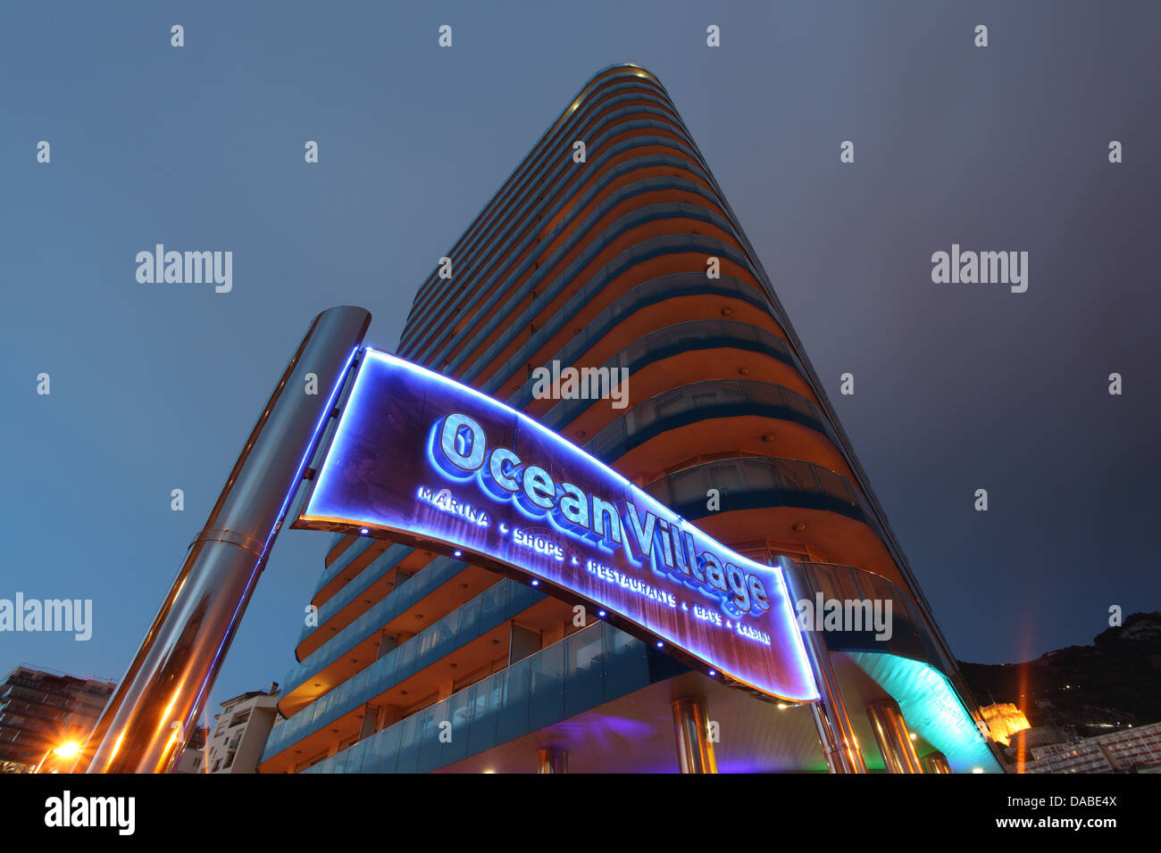 The Ocean Village in Gibraltar at night Stock Photo - Alamy