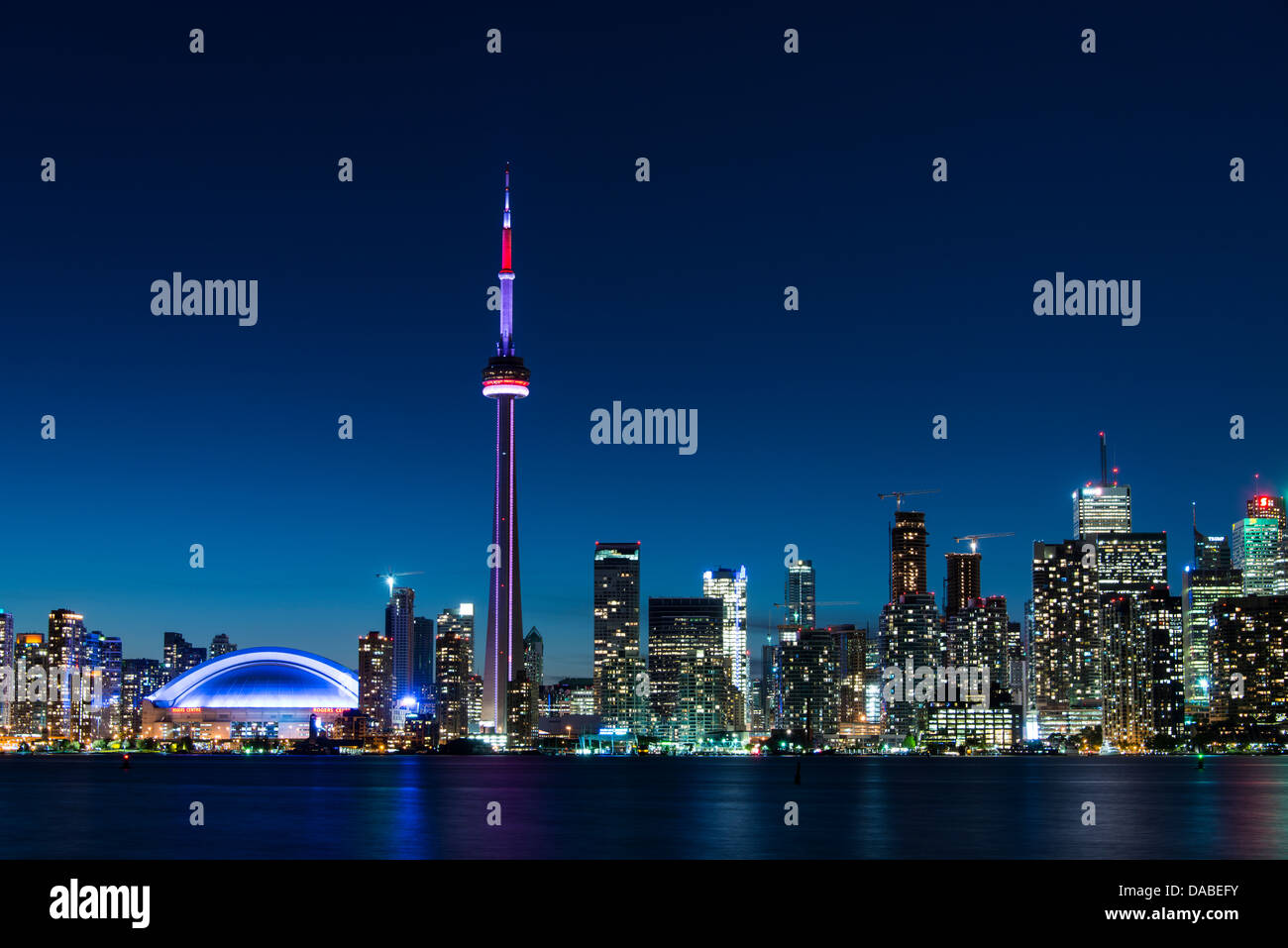 City skyline at dusk from near the Centre Island Ferry dock, Toronto ...