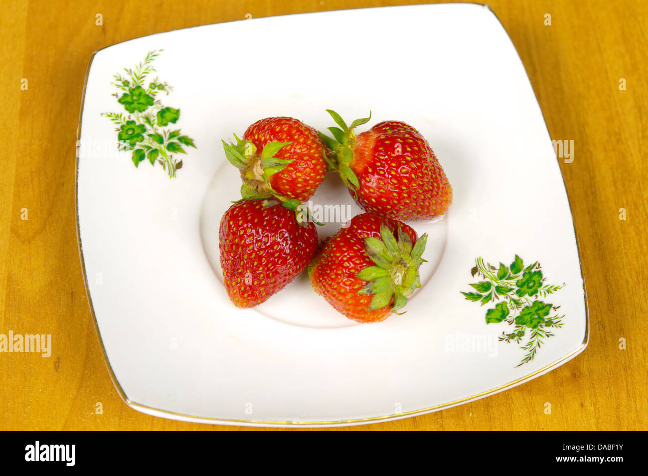 strawberry on plate Stock Photo - Alamy