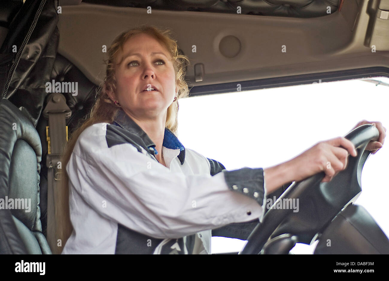 Blond woman truck driver checking hi-res stock photography and images ...