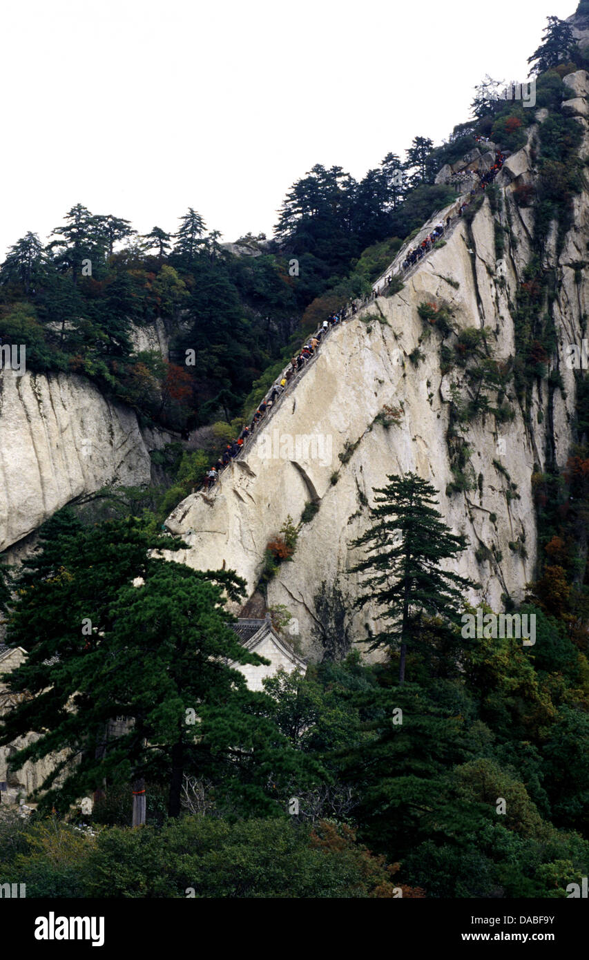 Chinese pilgrims and hikers making the ascent at sacred Hua Shan ...