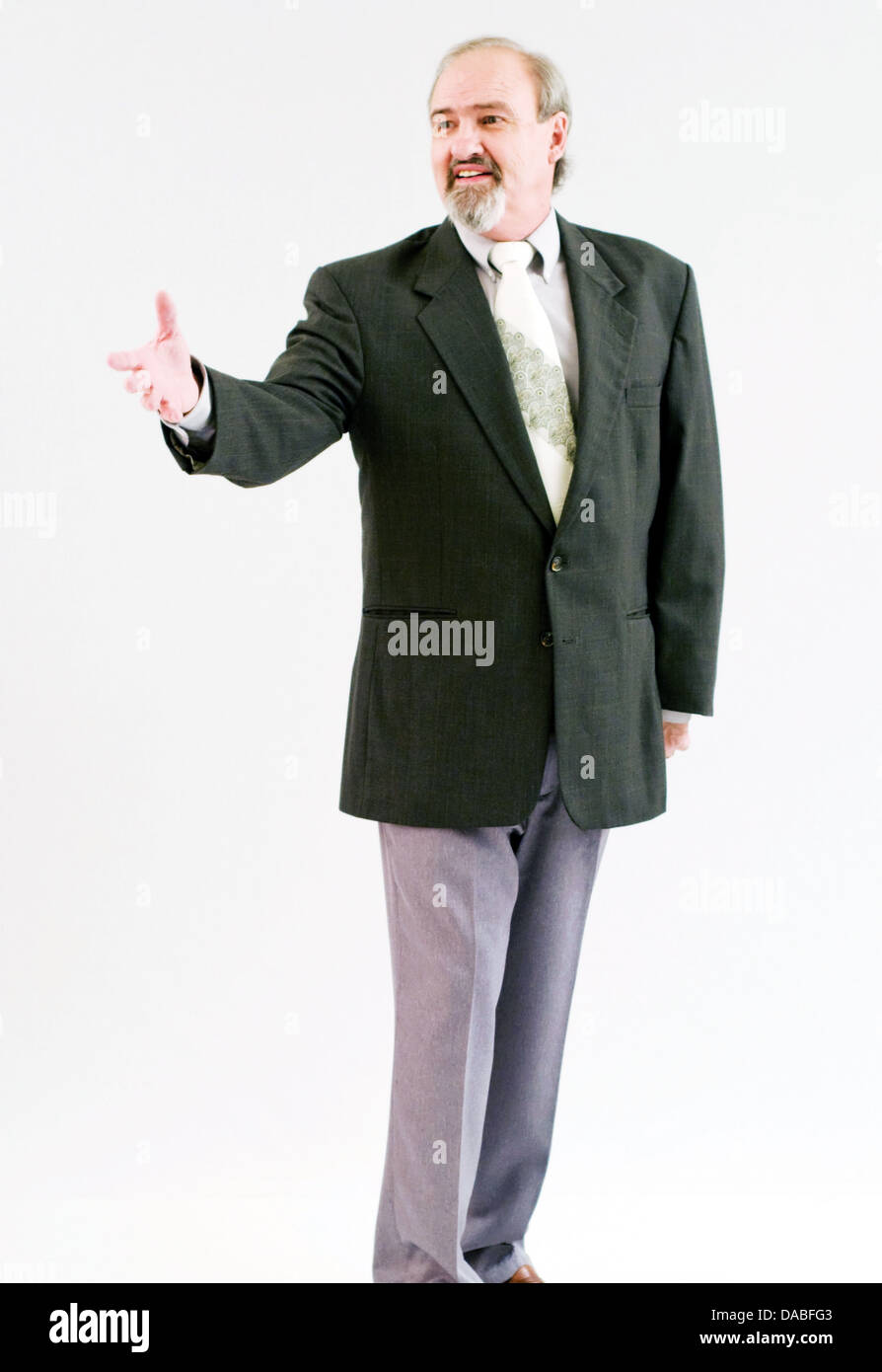 Businessman reaching out to shake hands with a potential client Stock ...