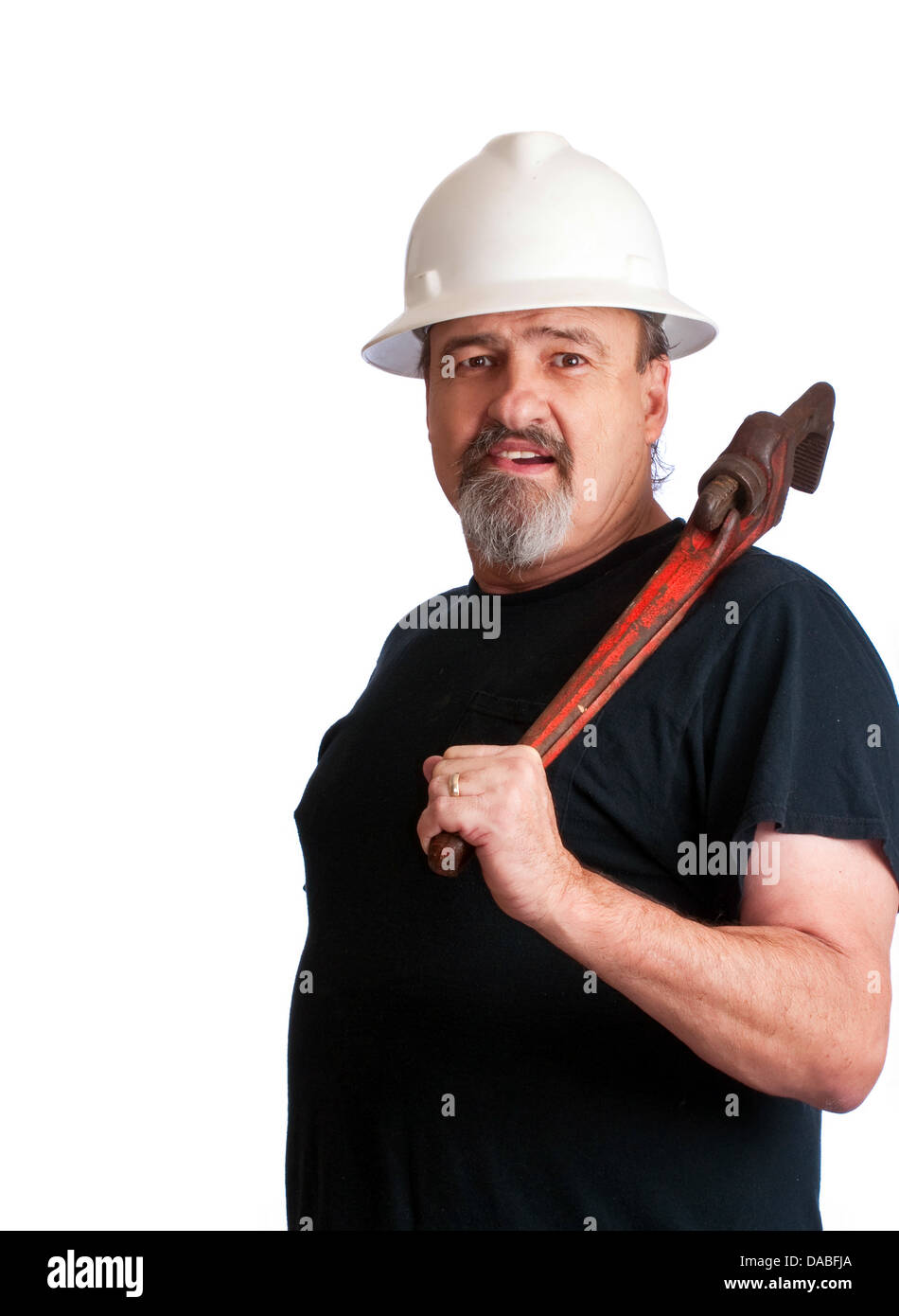 Construction worker with a pipe wrench over his shoulder Stock Photo ...