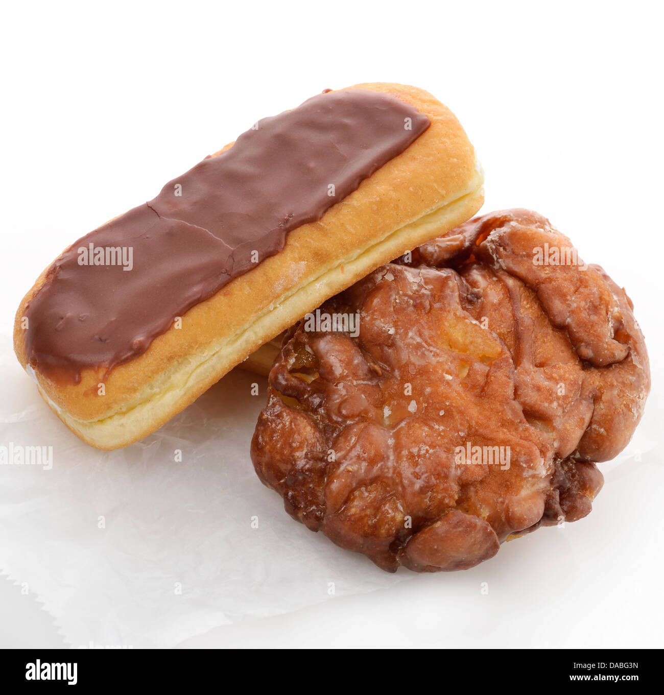 Two Donuts On A White Paper,Close Up Stock Photo - Alamy