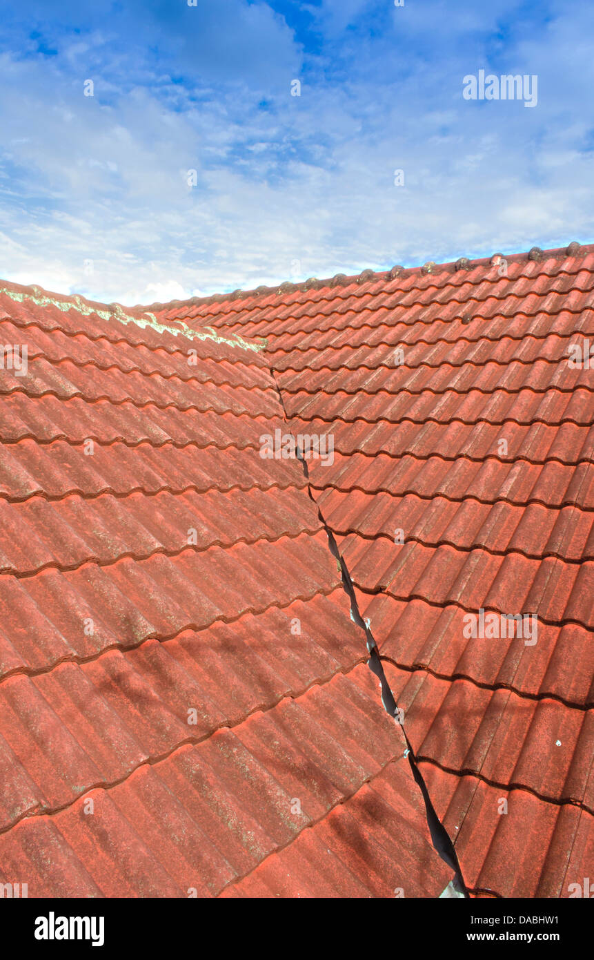 The Tiled Roof with Fluffy Cloud Blue Sky Stock Photo - Alamy