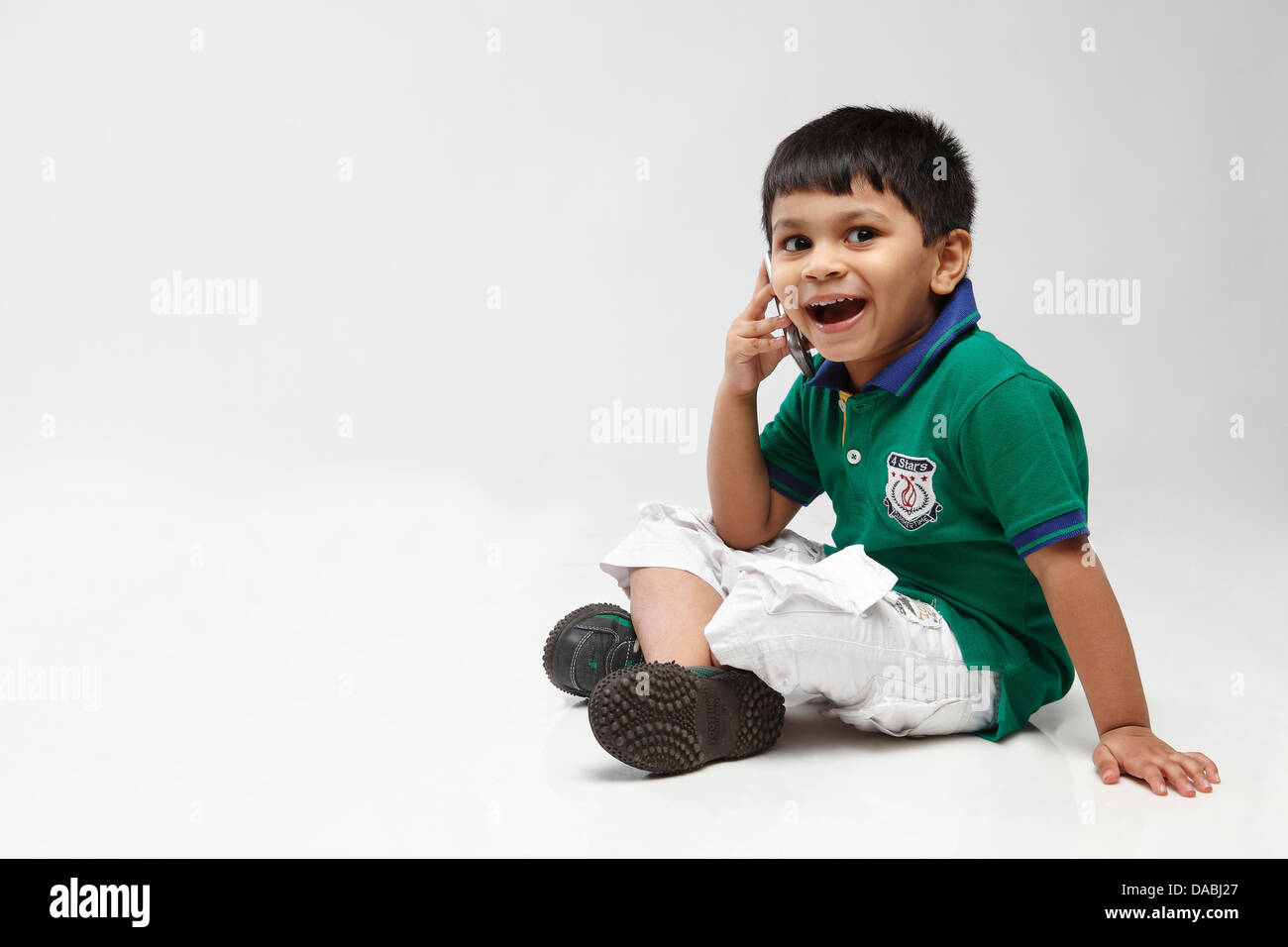 Little 5 year old Indian kid talking on mobile Stock Photo - Alamy