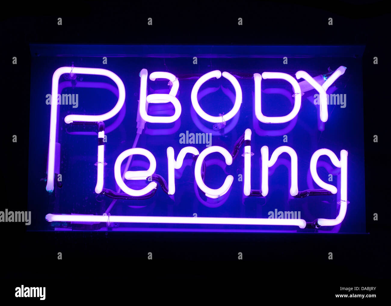Body piercing neon sign hi-res stock photography and images - Alamy