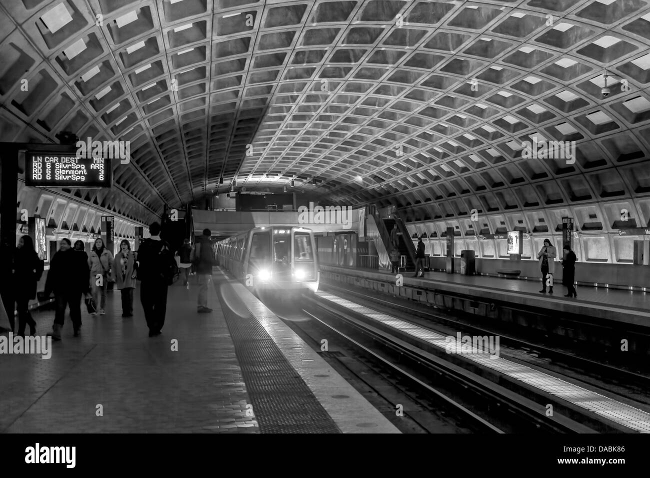Metro subway train passing through an underground Metro station in ...