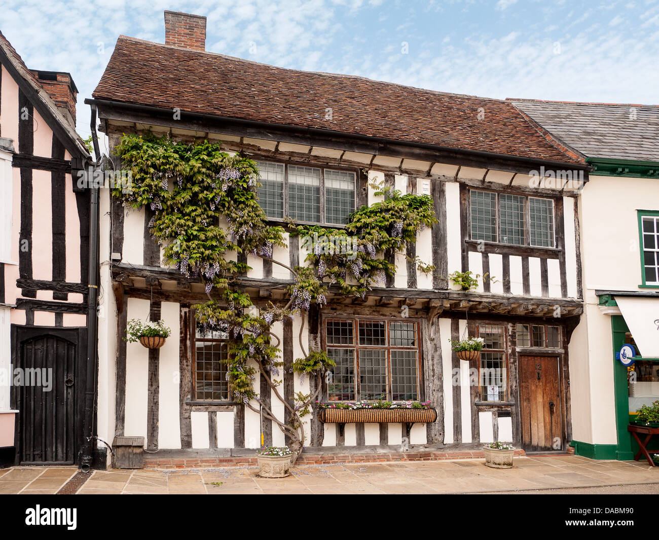 Half-timbered wooden shops and houses in the medieval village Lavenham ...
