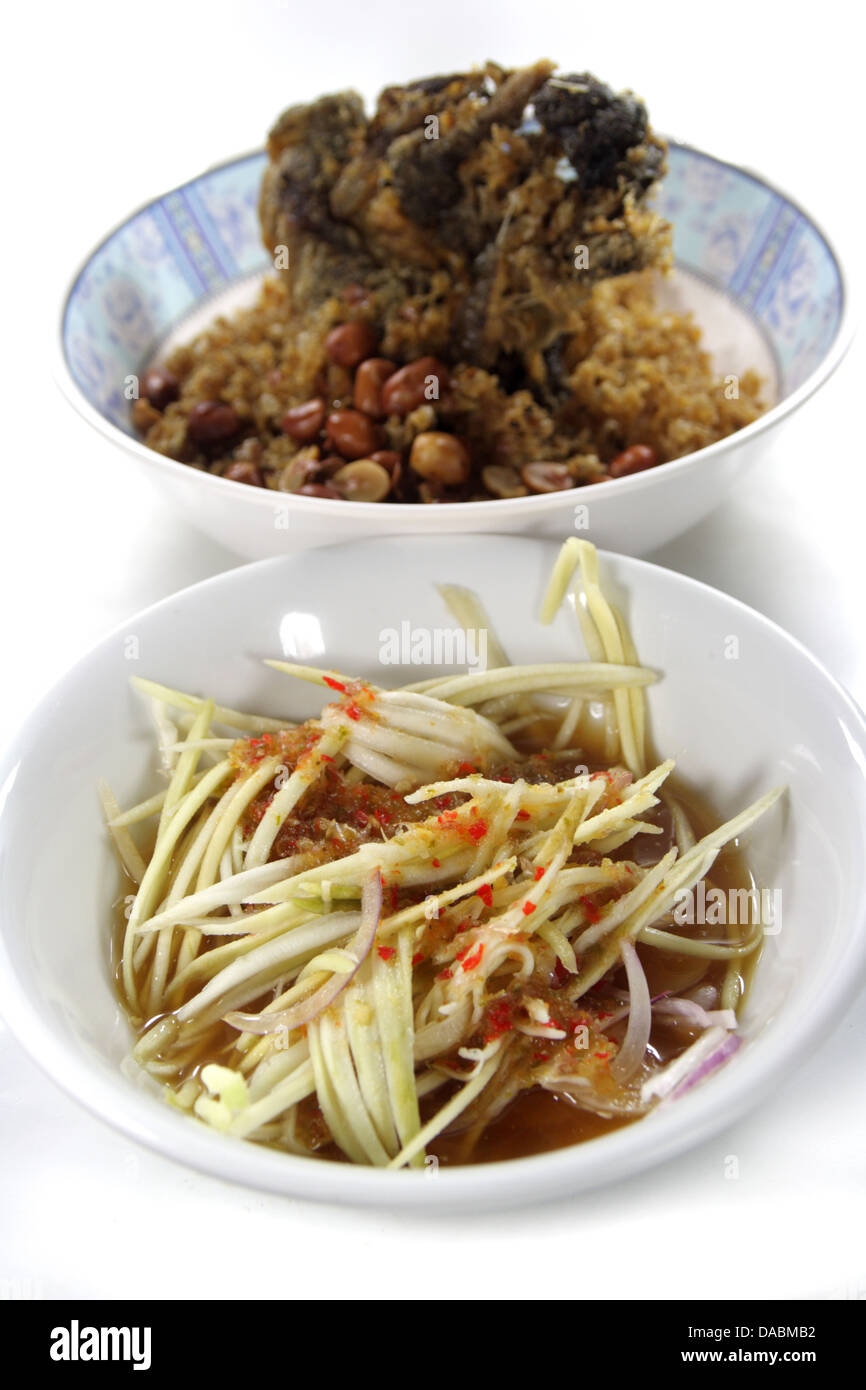 Thai Crispy Fish with Green Mango Salad – Yam Pla-Duk Fu Stock Photo ...