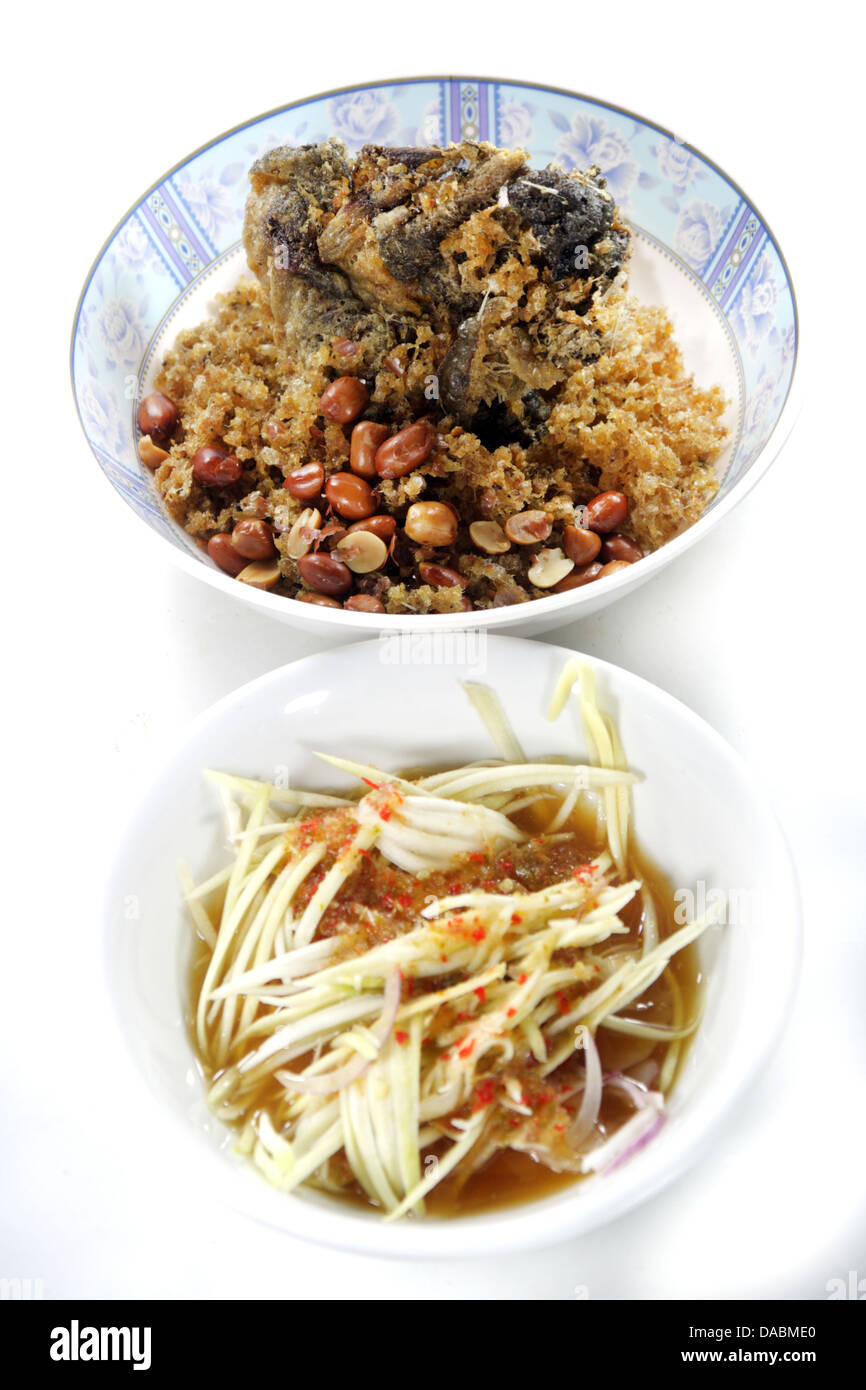 Thai Crispy Fish with Green Mango Salad – Yam Pla-Duk Fu Stock Photo ...