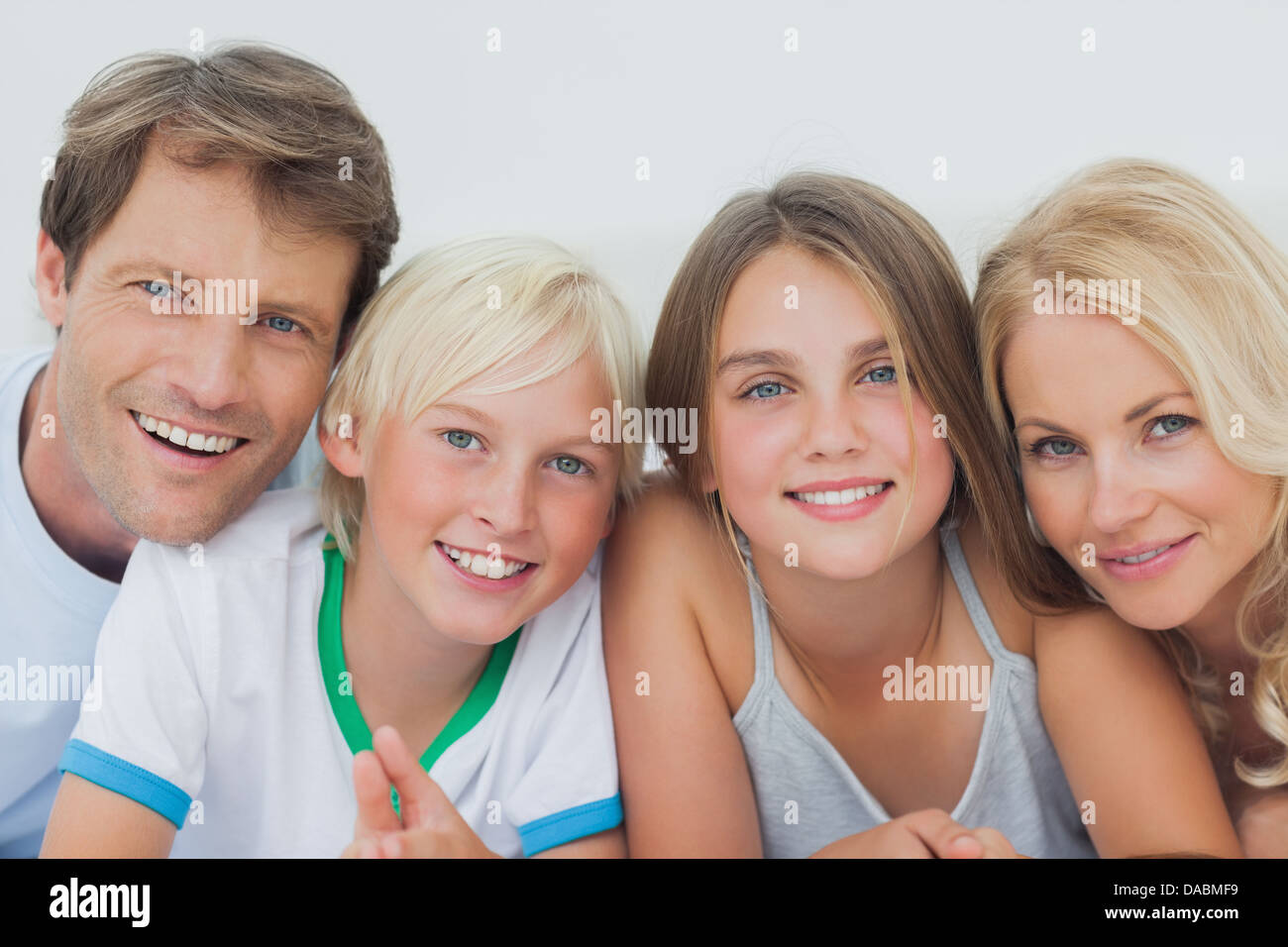 Portrait of a cheerful family Stock Photo - Alamy