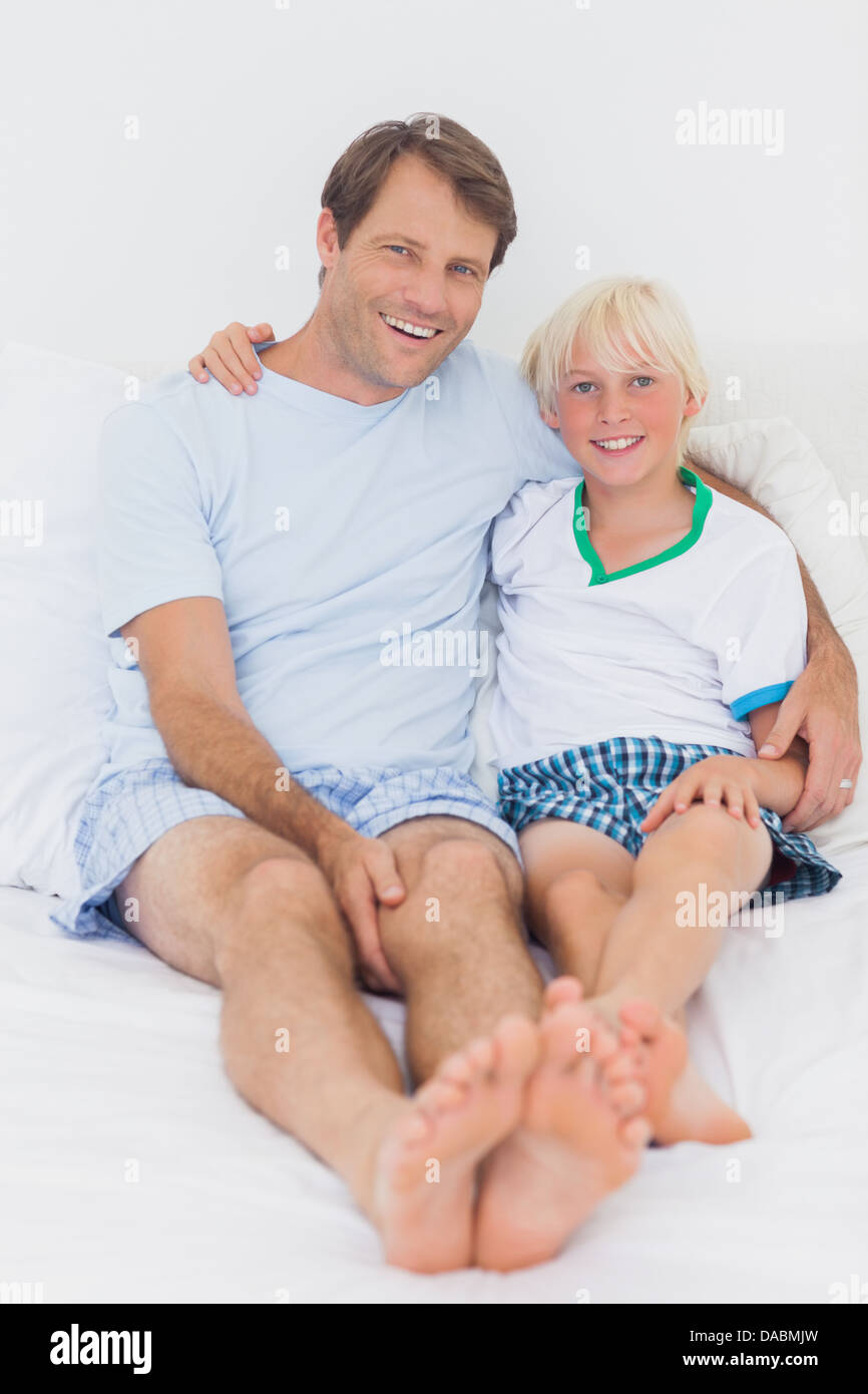 Portrait of a smiling father and son Stock Photo - Alamy
