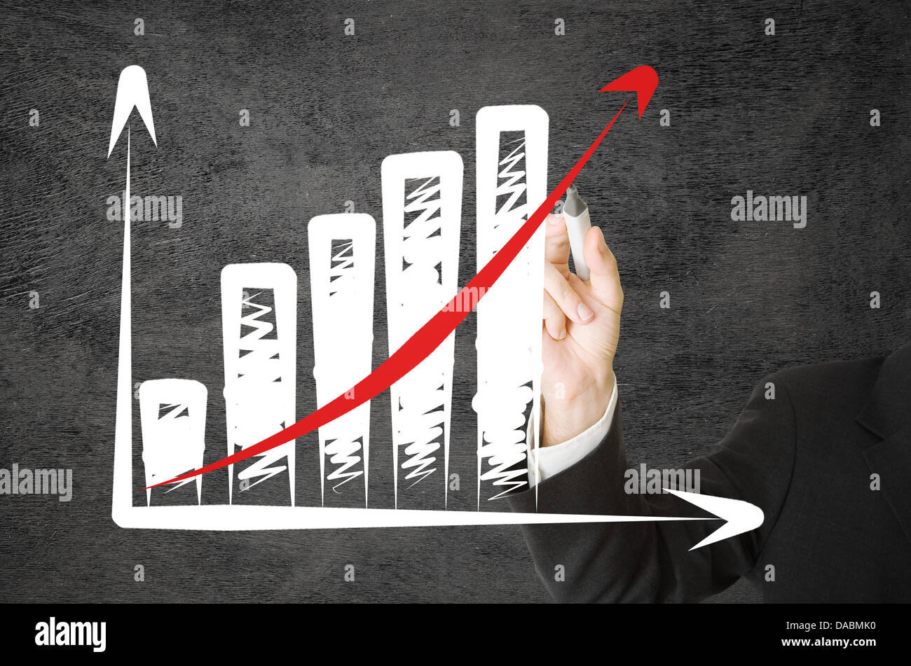 Businessman drawing rising graph with red arrow - success or strategy ...