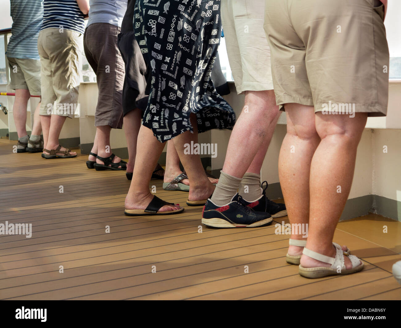 Oman, Dhofar, Salalah Port, MV Minerva legs of passengers looking out ...