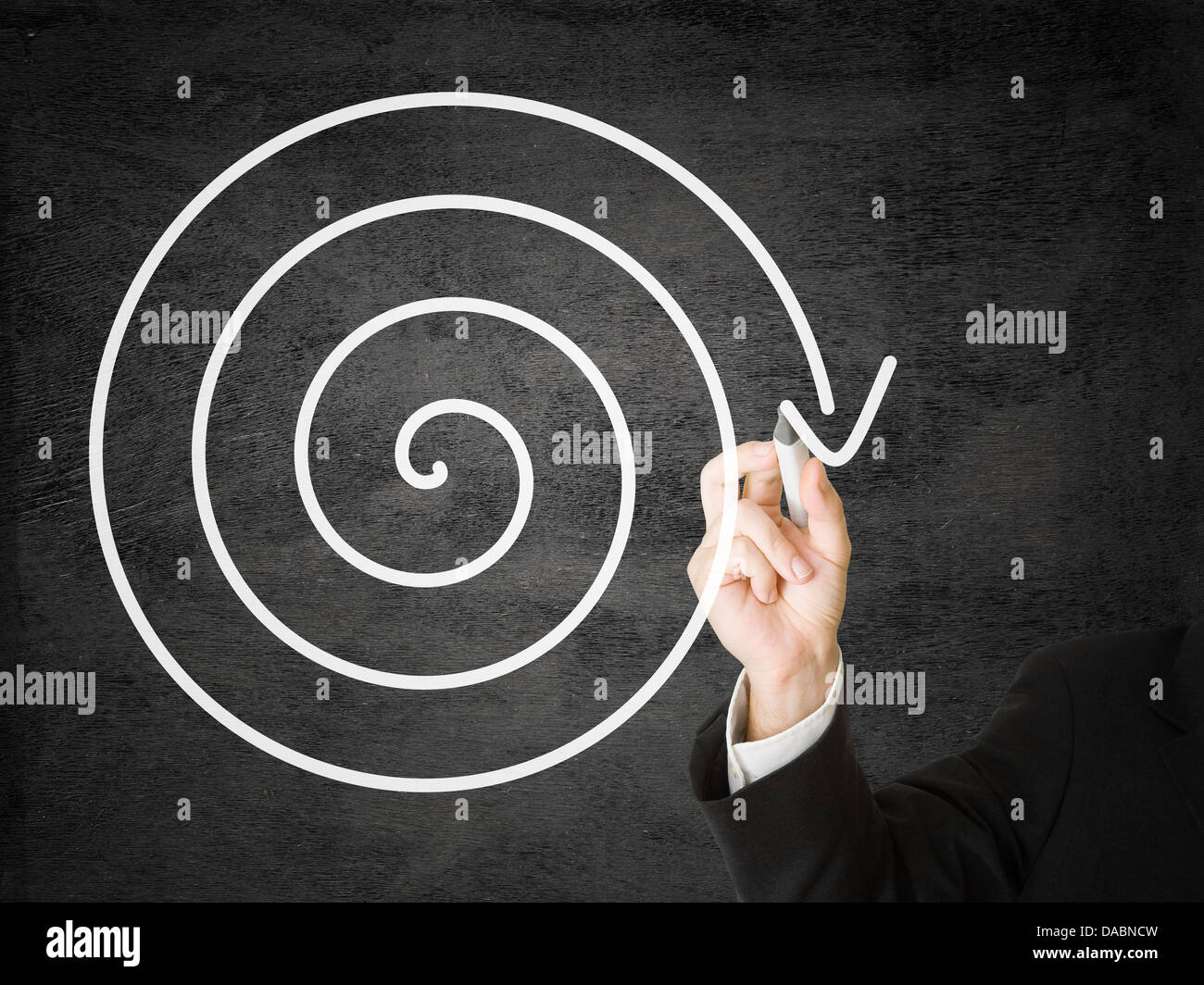 Businessman drawing spiral - solution or problem solving concept Stock ...