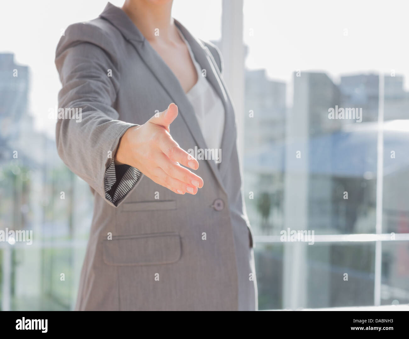 Businesswomans hand reaching out Stock Photo - Alamy