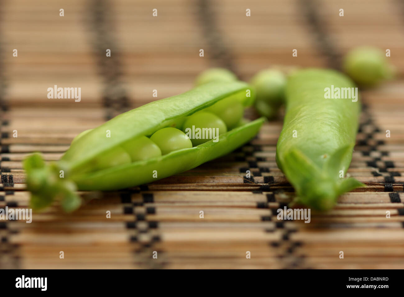 Still Life with pods of green peas Stock Photo - Alamy