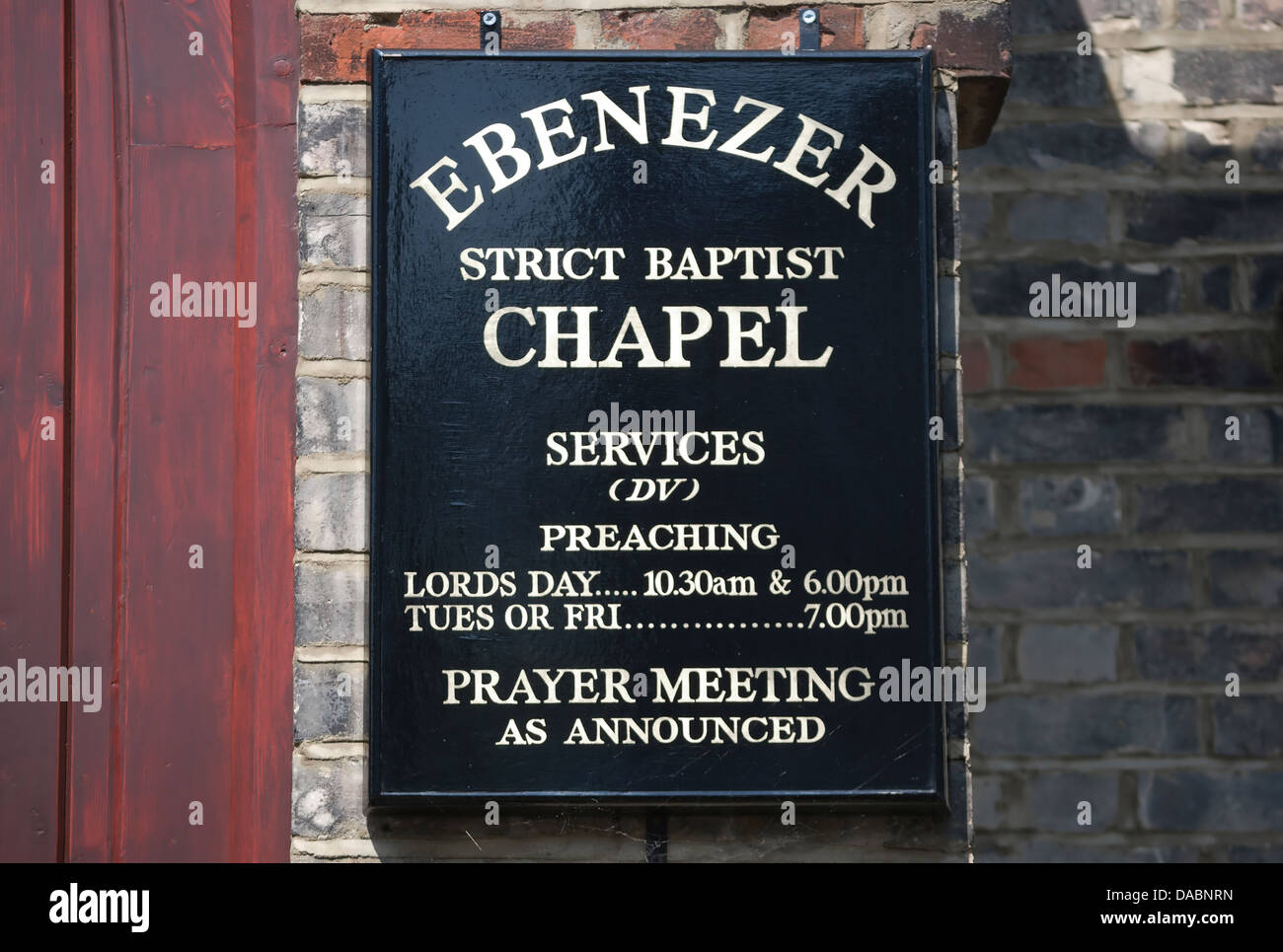 sign on exterior of ebenezer strict baptist chapel, kew, surrey ...