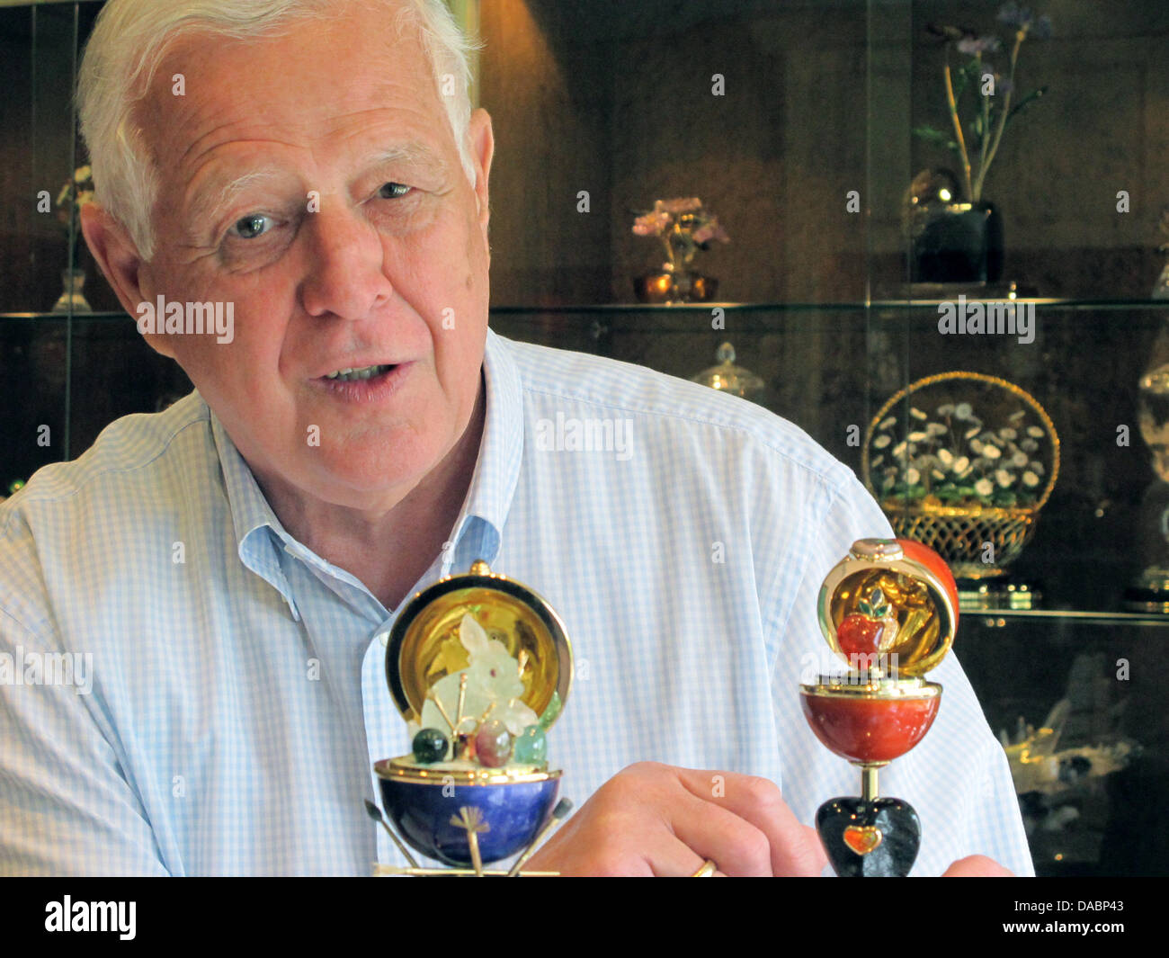 Jeweler Manfred Wild stands with some of his creations in Idar ...