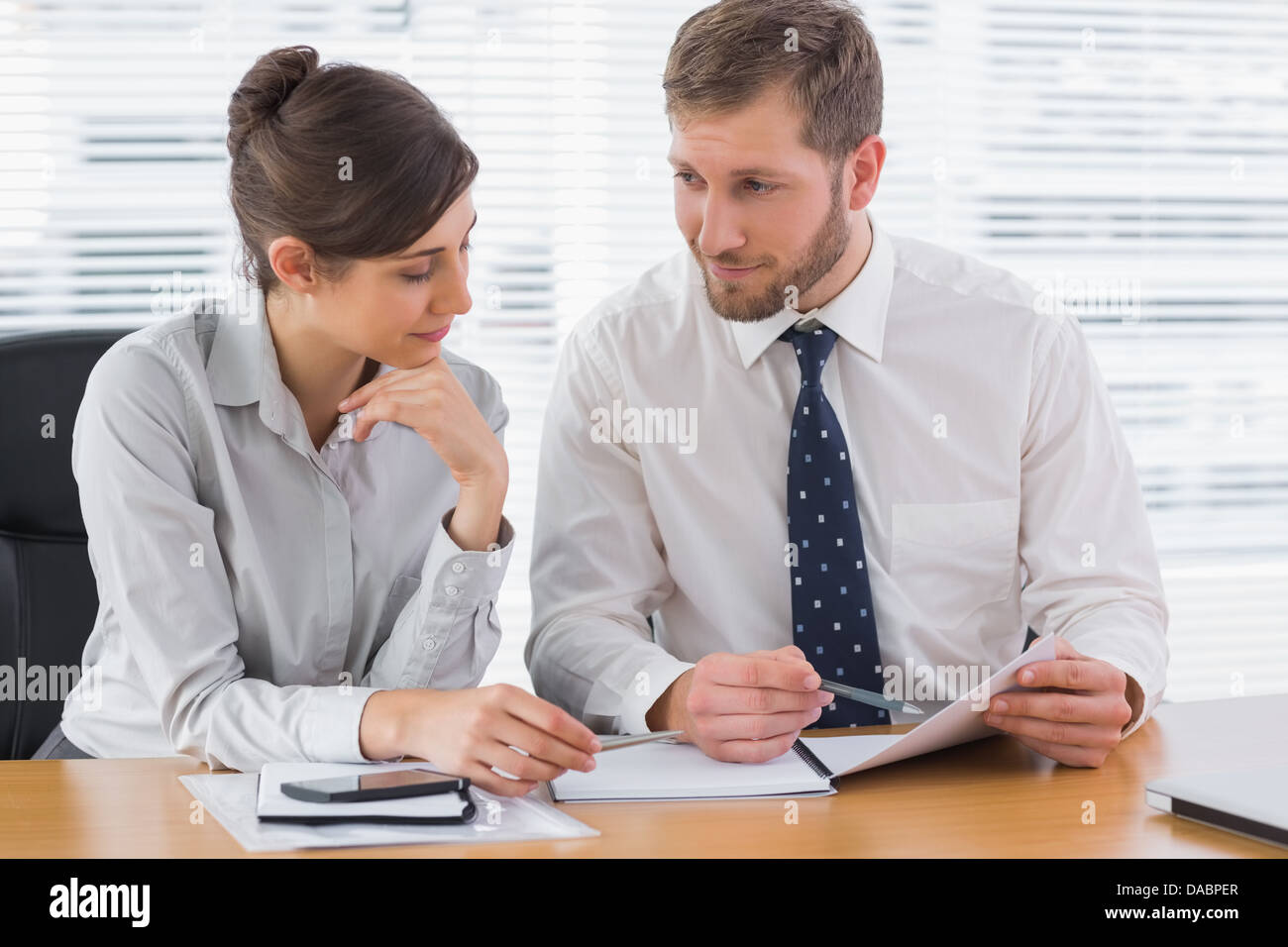 Business people working on documents Stock Photo - Alamy