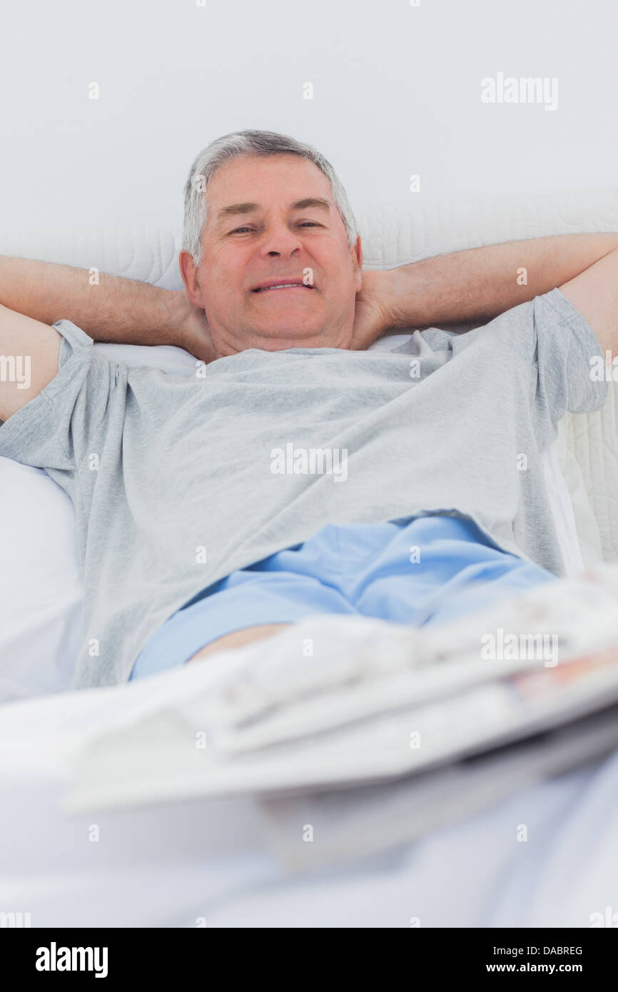 Man relaxing in bed hi-res stock photography and images - Alamy