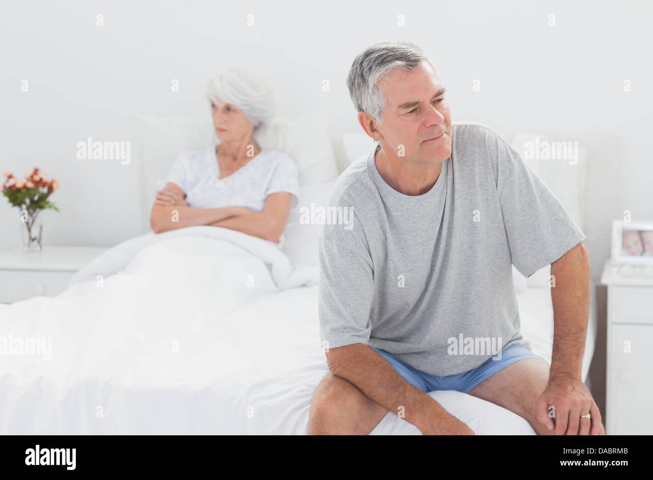 Angry man woman sitting hi-res stock photography and images - Alamy