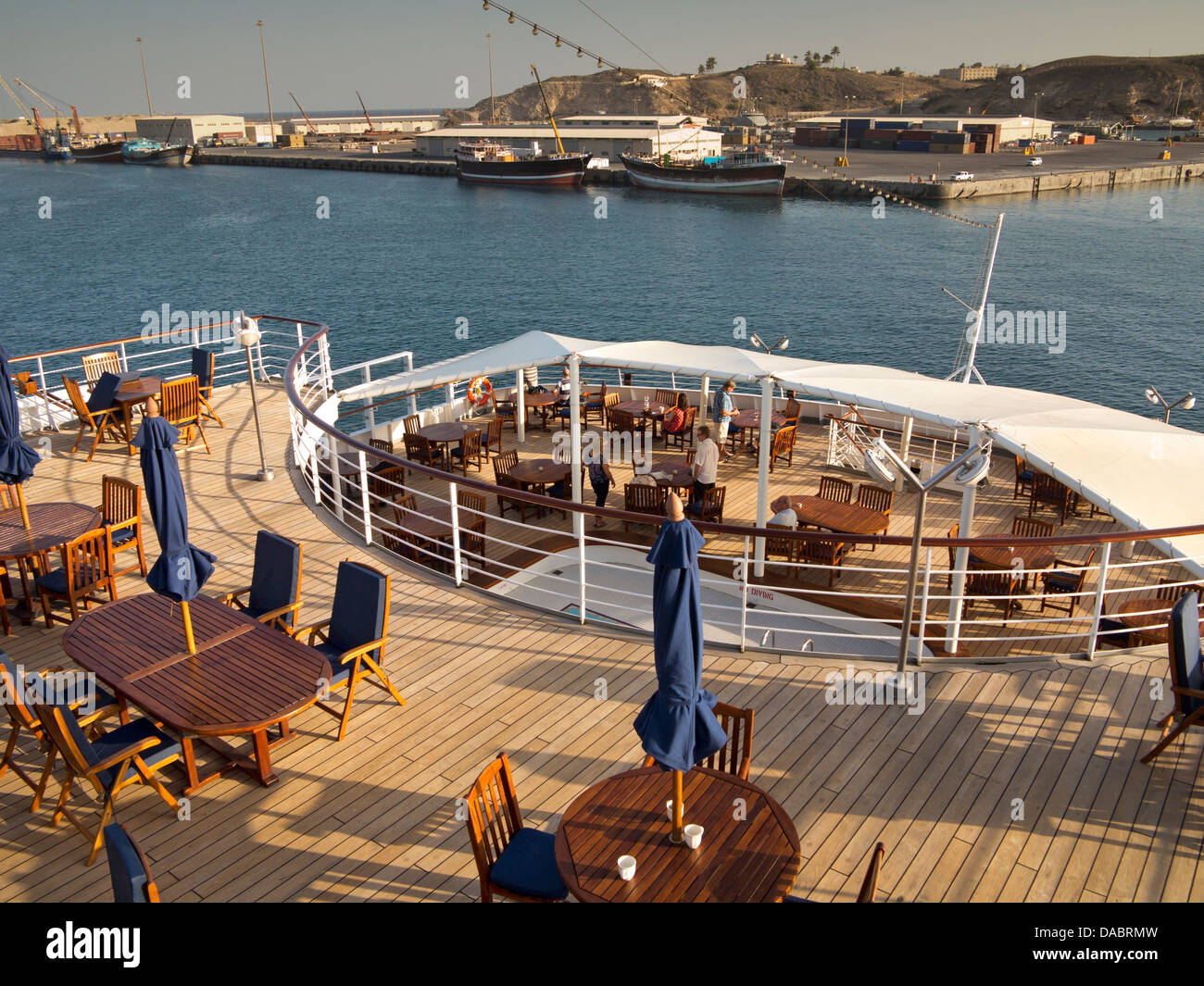 Oman, Dhofar, Salalah, Port, rear decks of MV Minerva departing harbour ...