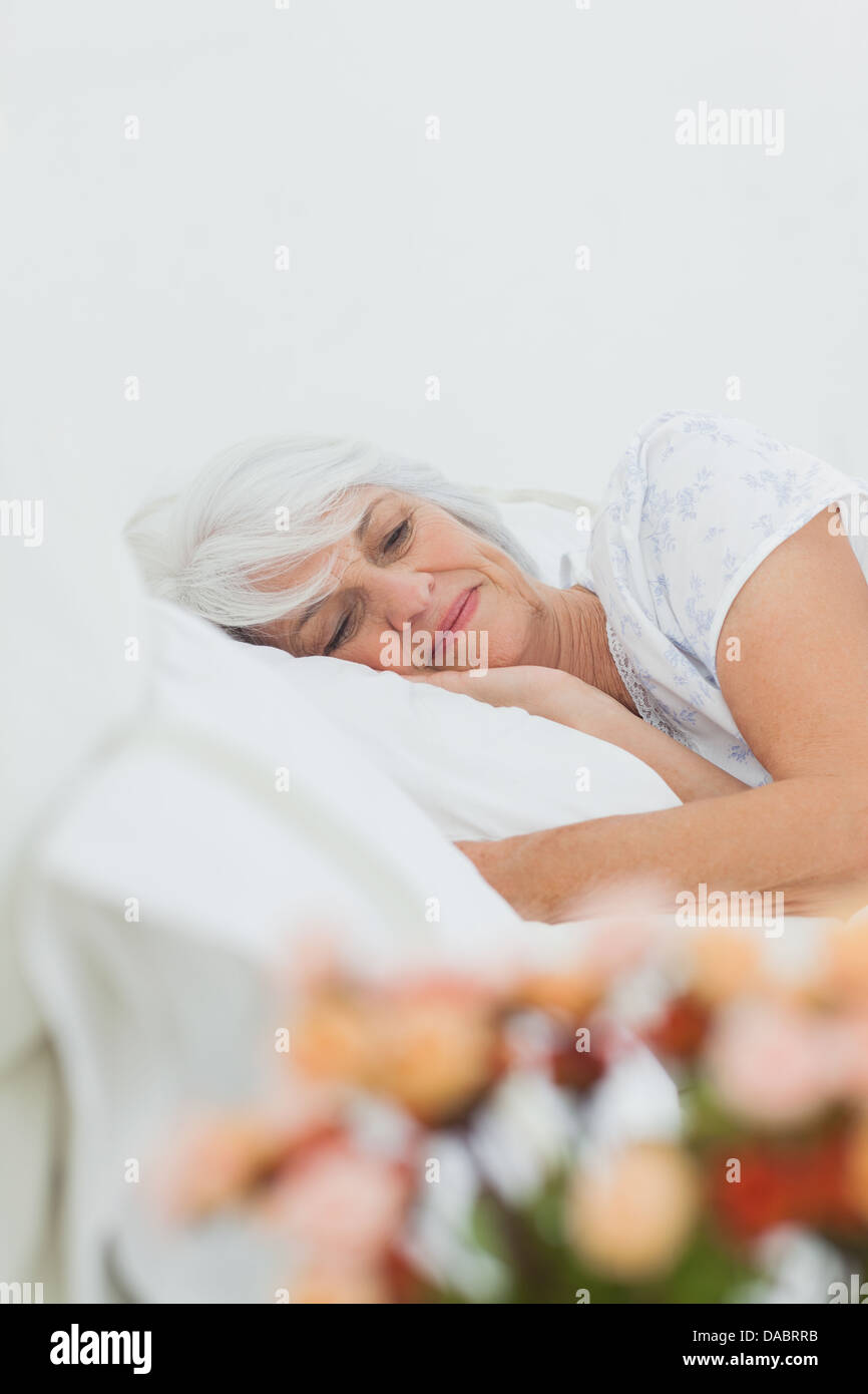 Woman sleeping hi-res stock photography and images - Alamy
