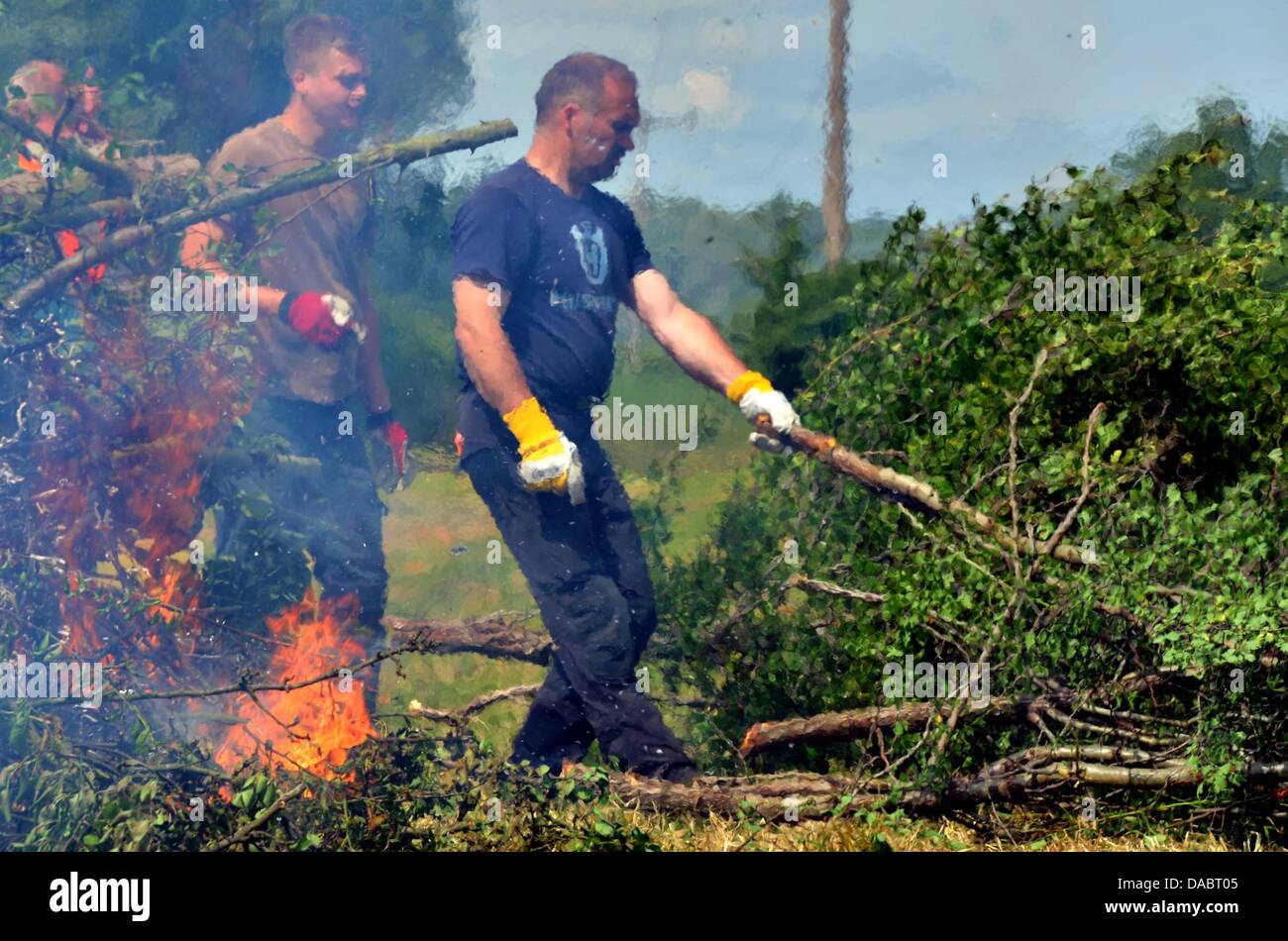 Foresters burn plants infected by fire blight near Seeburg, Germany, 10 ...