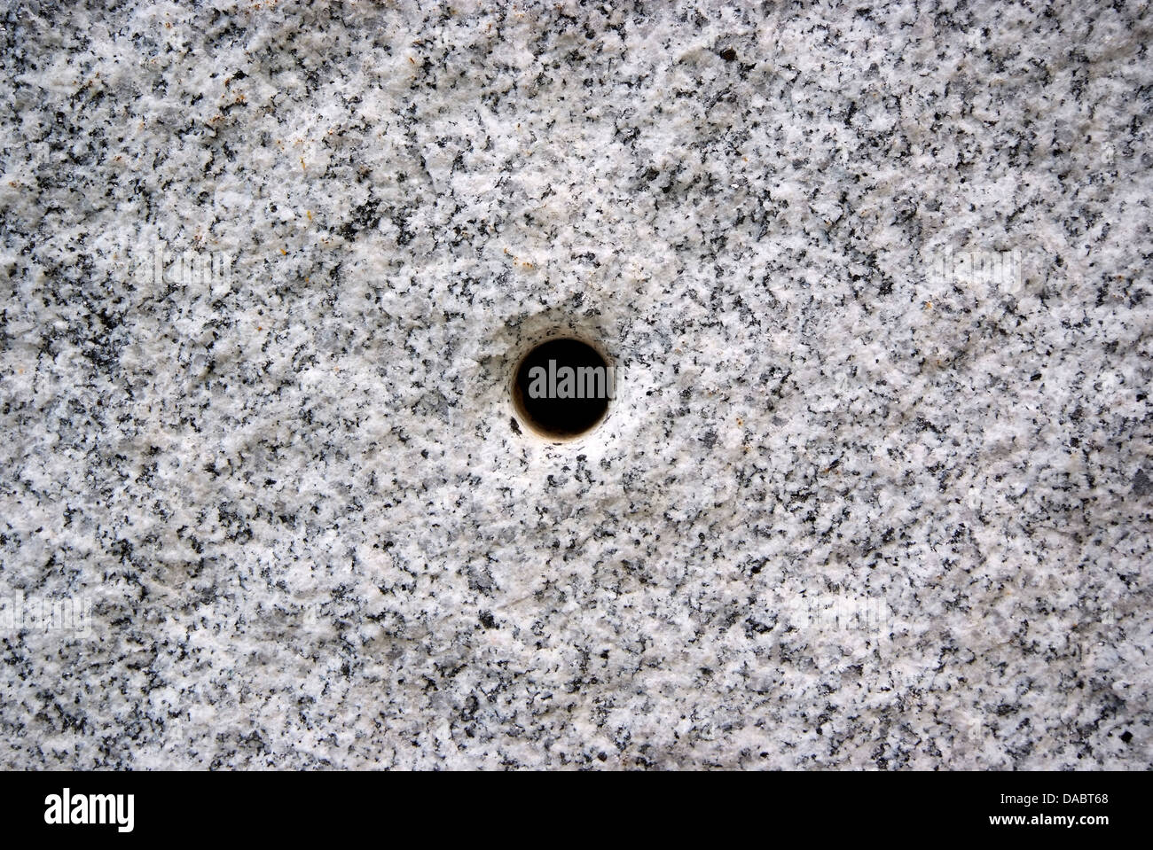 Round hole on the granite.The surface of Black and white granite stone ...