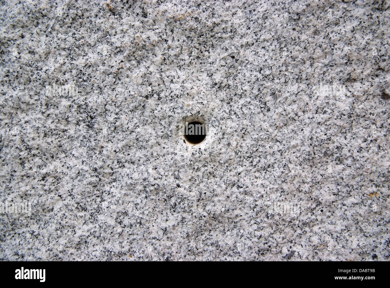 Round hole on the granite.The surface of Black and white granite stone ...