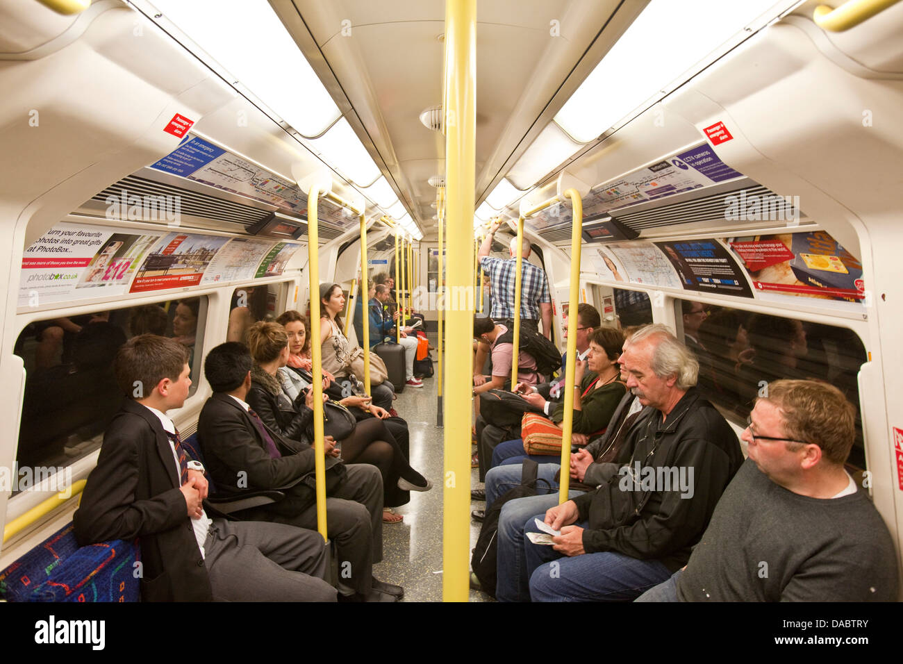 Travellers On The London Underground, London, England Stock Photo - Alamy