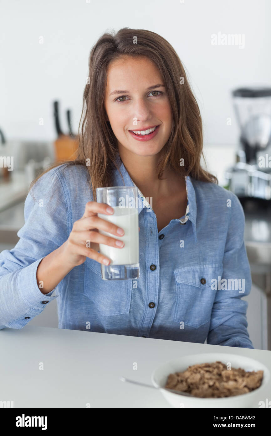 Woman holding glass of milk hi-res stock photography and images - Alamy