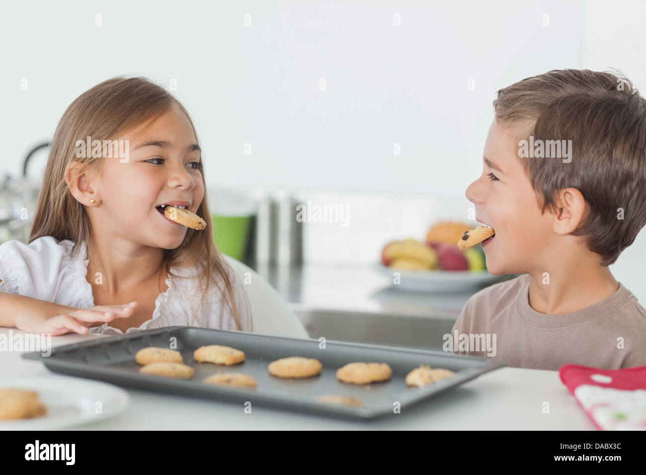Boy eating cookies in hi-res stock photography and images - Alamy