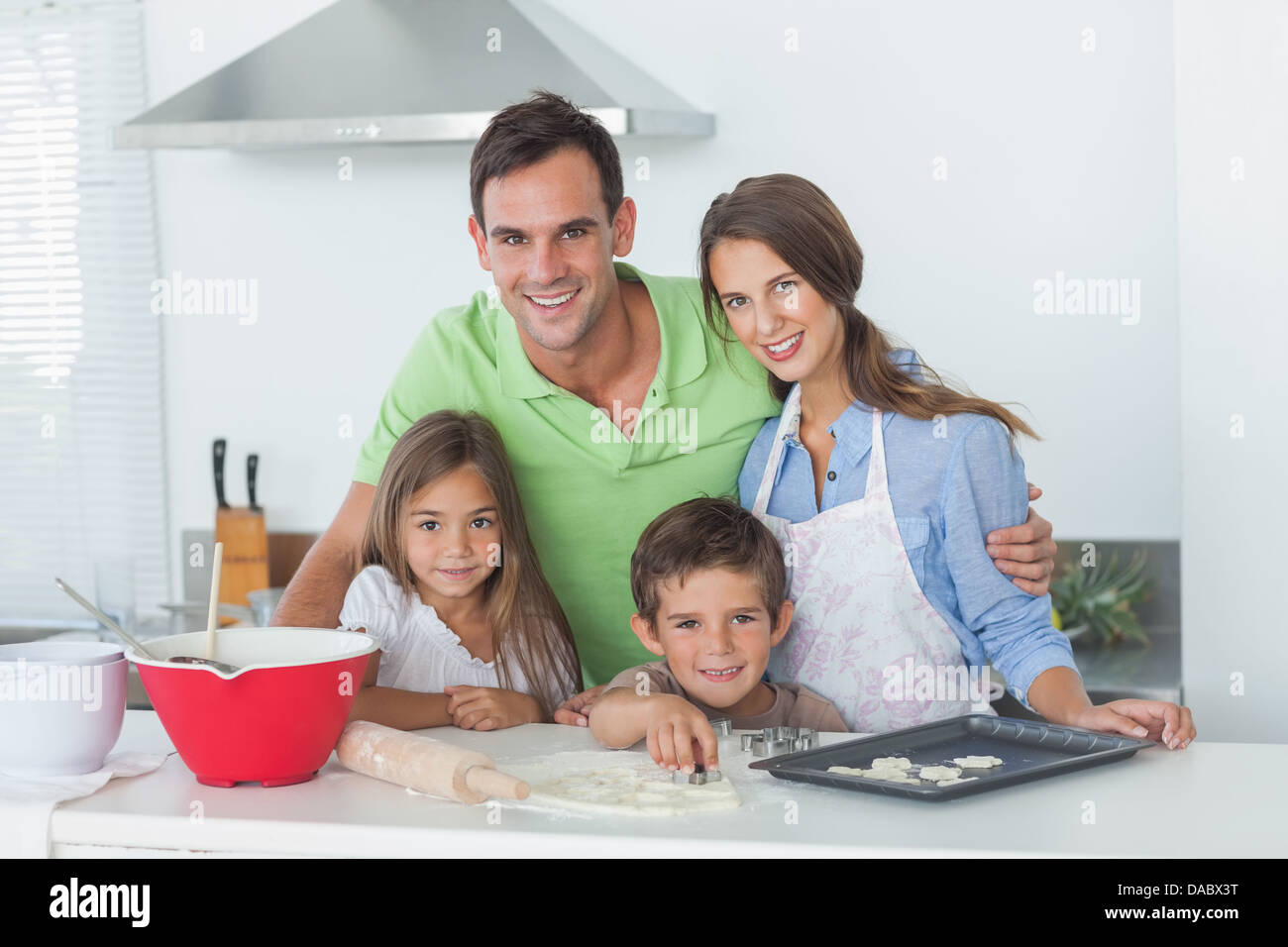 Family baking together in the kitchen Stock Photo - Alamy