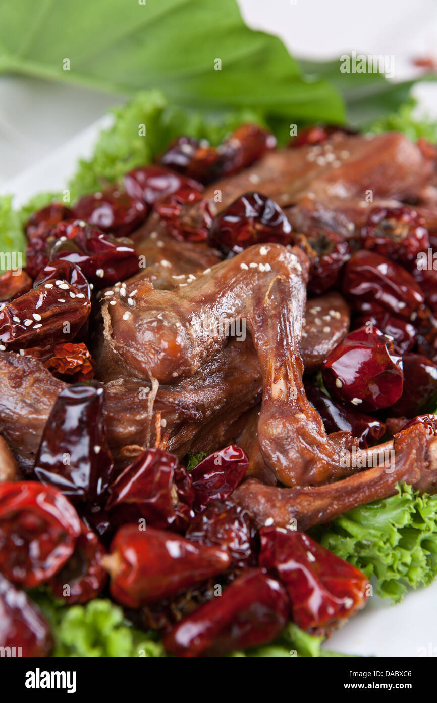 food in china- chili fried pigeon Stock Photo - Alamy