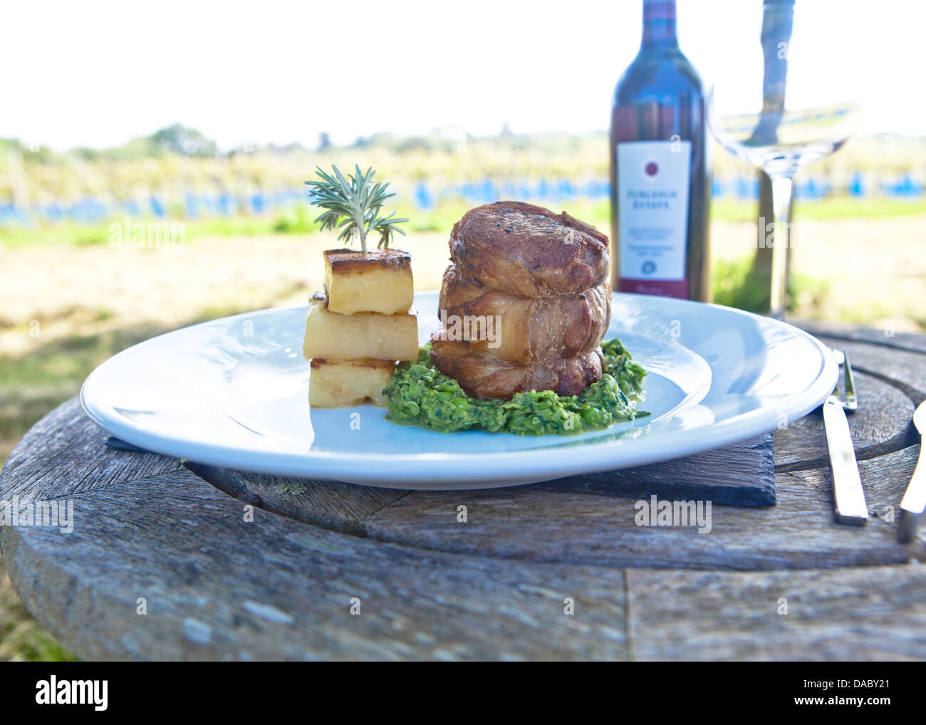 Alfresco fine dining roast British lamb dinner Stock Photo - Alamy