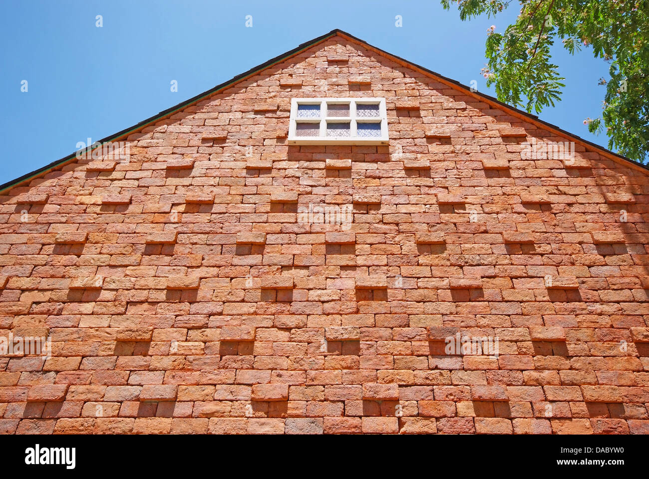 White window on the brick building and blue sky Stock Photo - Alamy