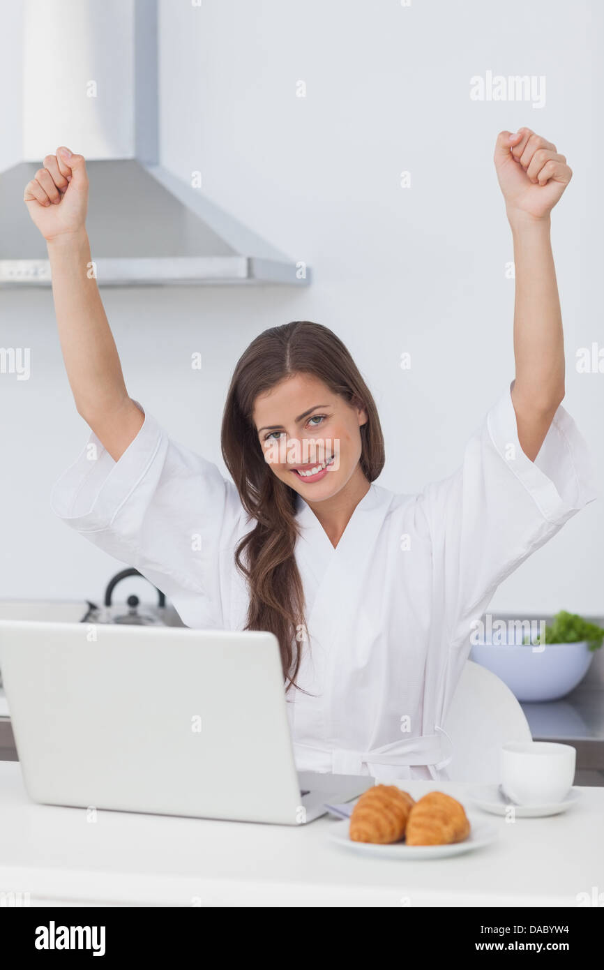 Woman happy laptop arms hi-res stock photography and images - Alamy