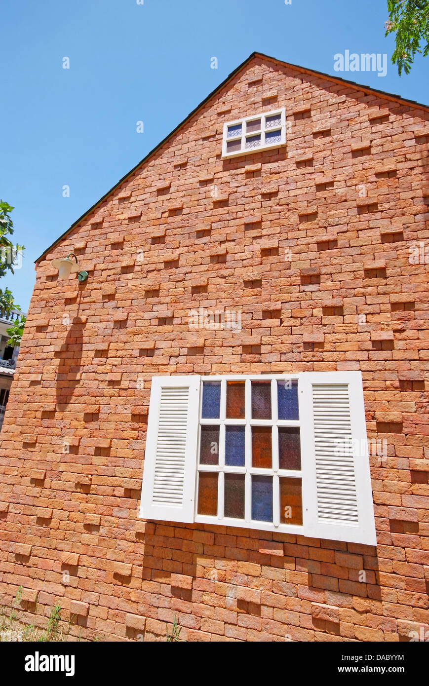 White window on the brick building and blue sky Stock Photo - Alamy