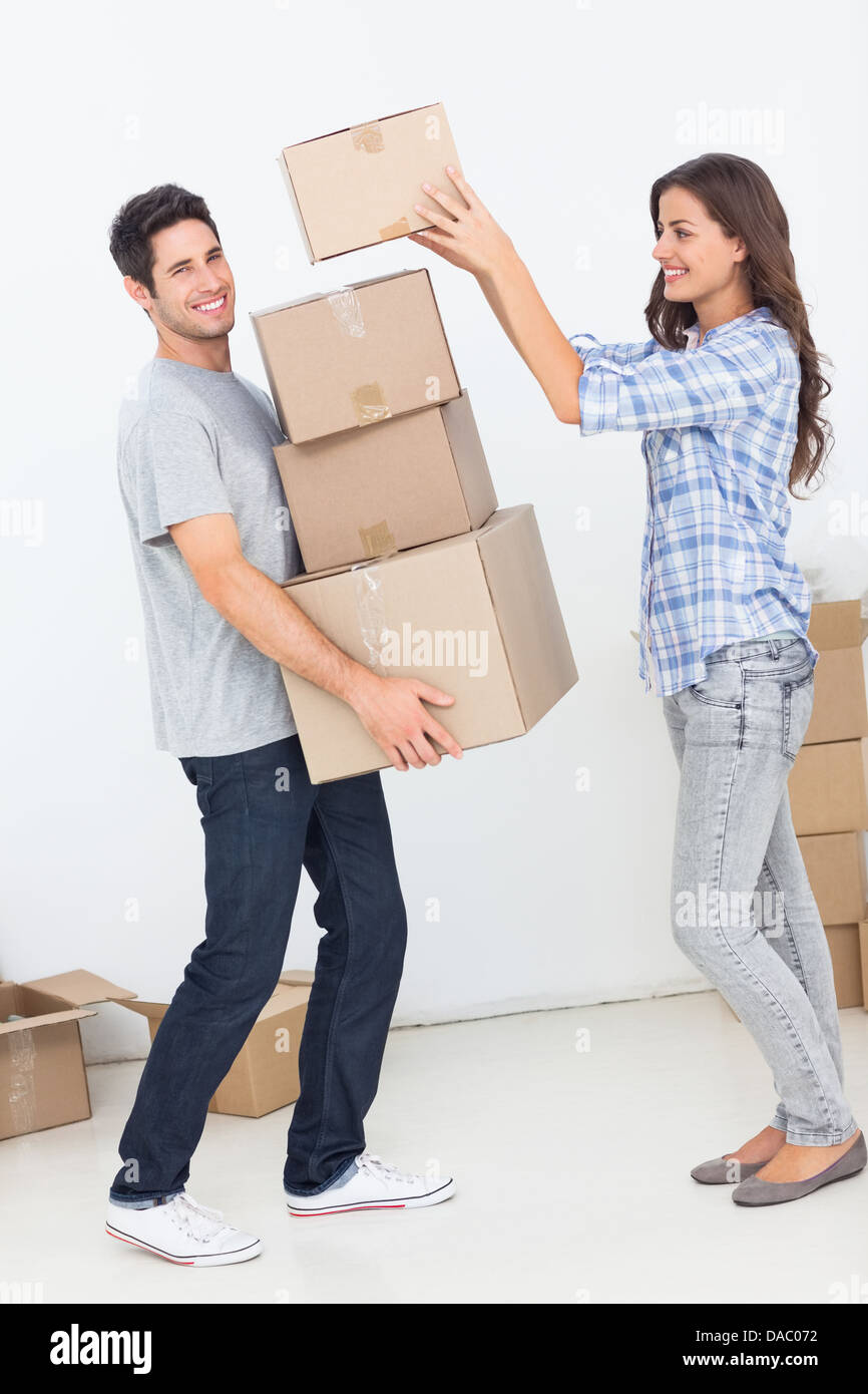 Man woman standing boxes hi-res stock photography and images - Alamy